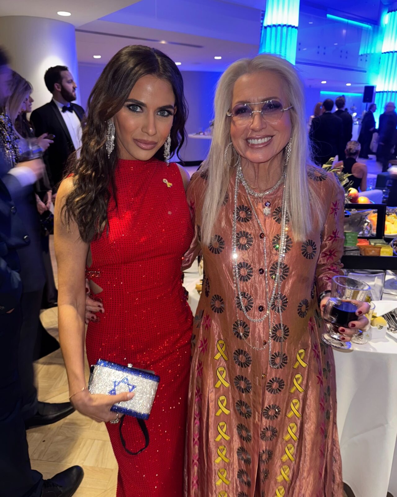 Miriam Adelson’s hostage-ribbon dress makes an impression